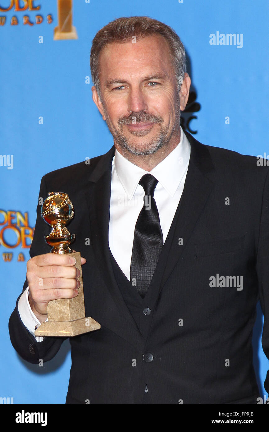 Kevin Costner poses in the press room at the 70th Annual Golden Globe ...