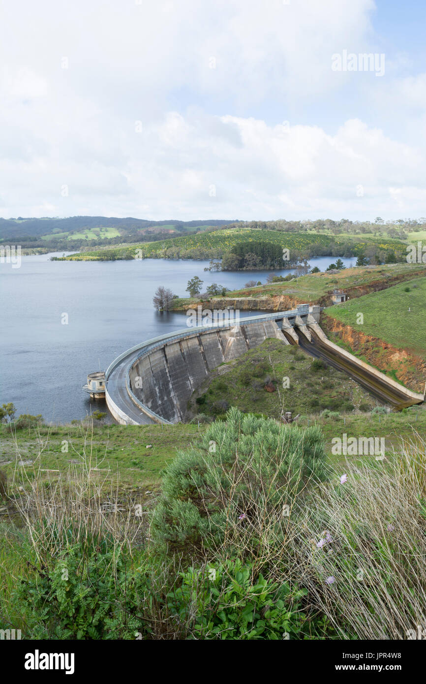 Concrete arch dam with ski-jump spillway of the Myponga Reservoir in ...