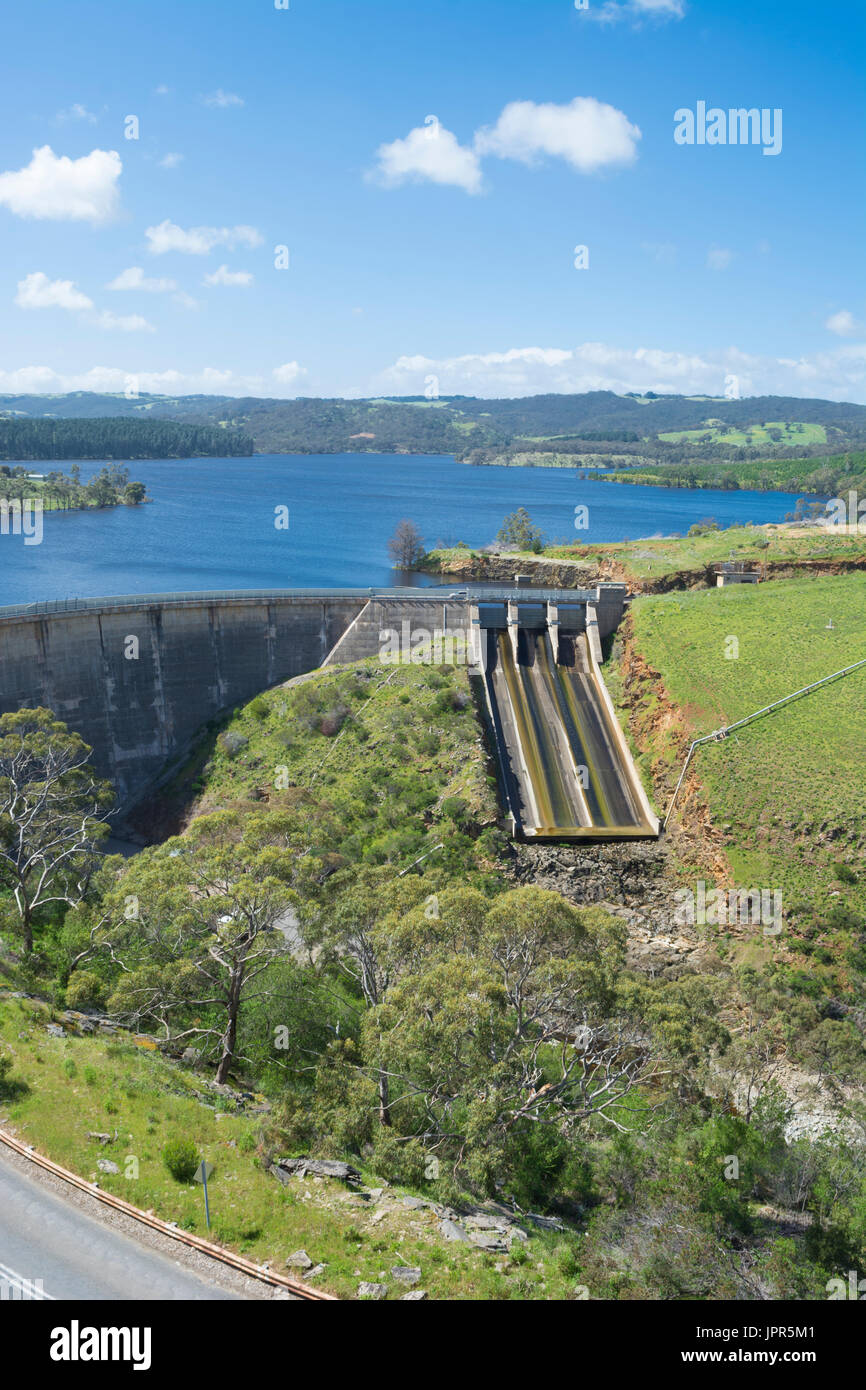 Concrete arch dam with ski-jump spillway of the Myponga Reservoir in ...