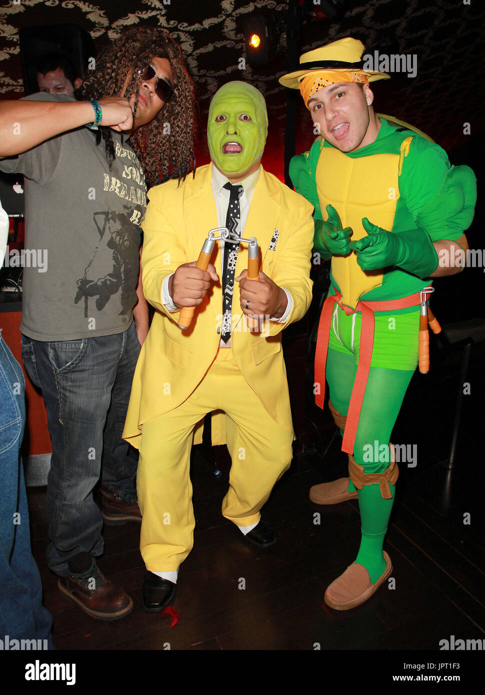 (l-r) guest, Manny Streetz and Pacific Rim Video's Chris Trondsen at ...