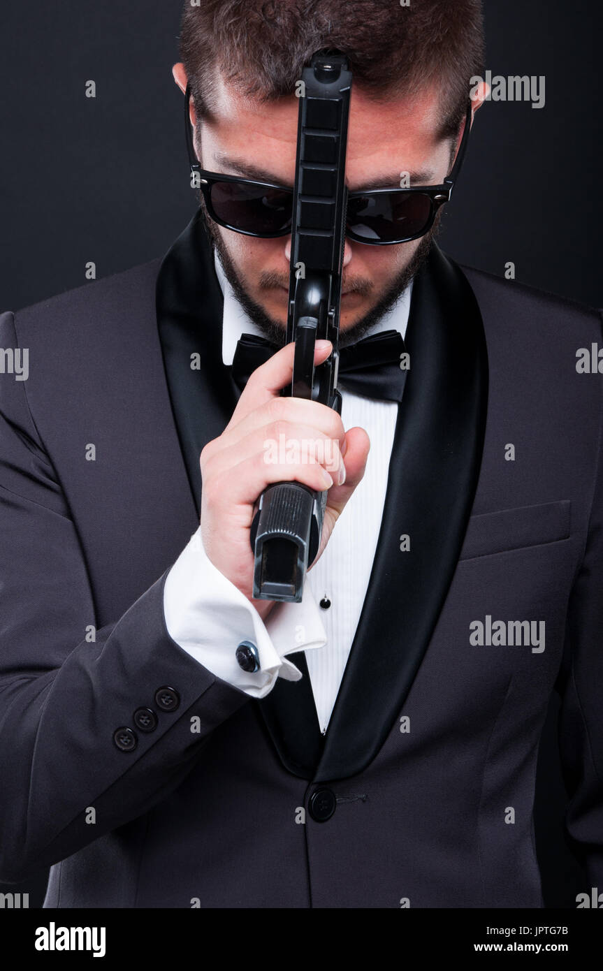 Pistol revolver in hand gangster hi-res stock photography and images ...
