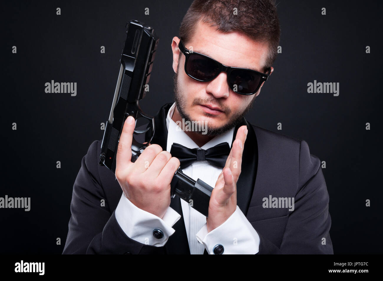 Loading revolver hi-res stock photography and images - Alamy