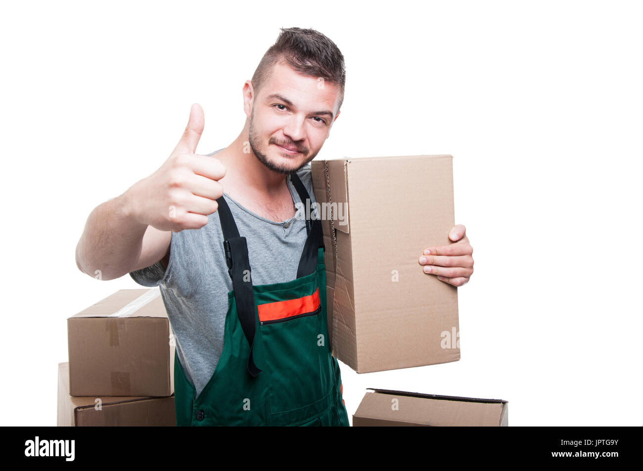 Mover guy holding cardboard box showing thumb up gesture and smiling ...