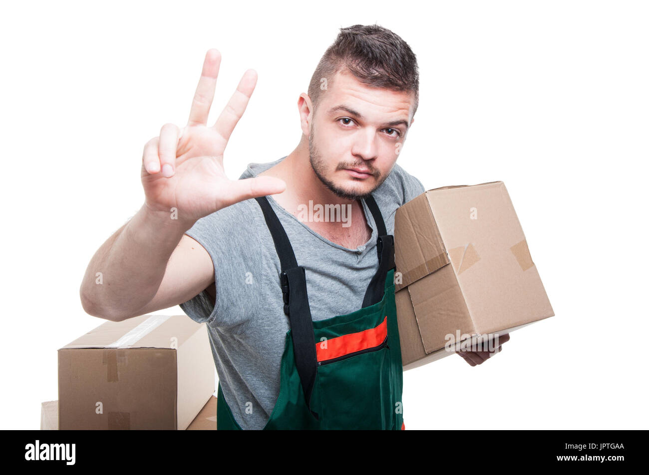 Mover guy holding cardboard box showing number threeMover guy holding ...