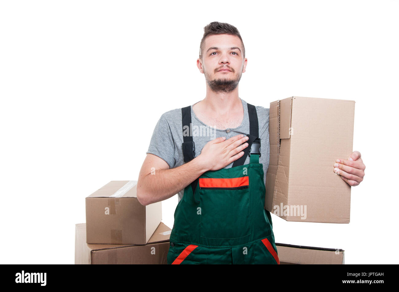 Mover guy holding cardboard box making oath gesture looking proud ...