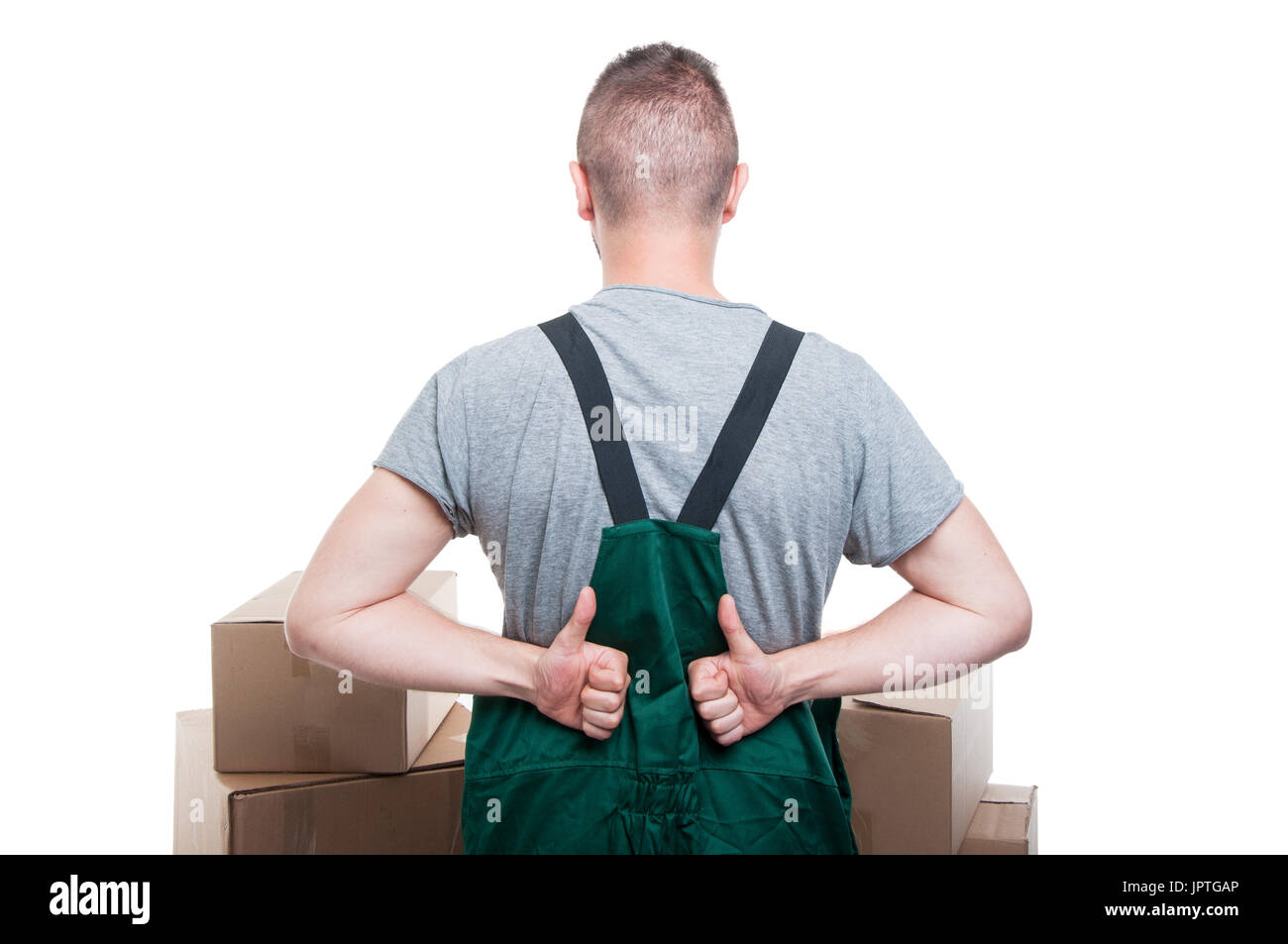 Back view of mover guy showing thumbs up with cardboard boxes around ...