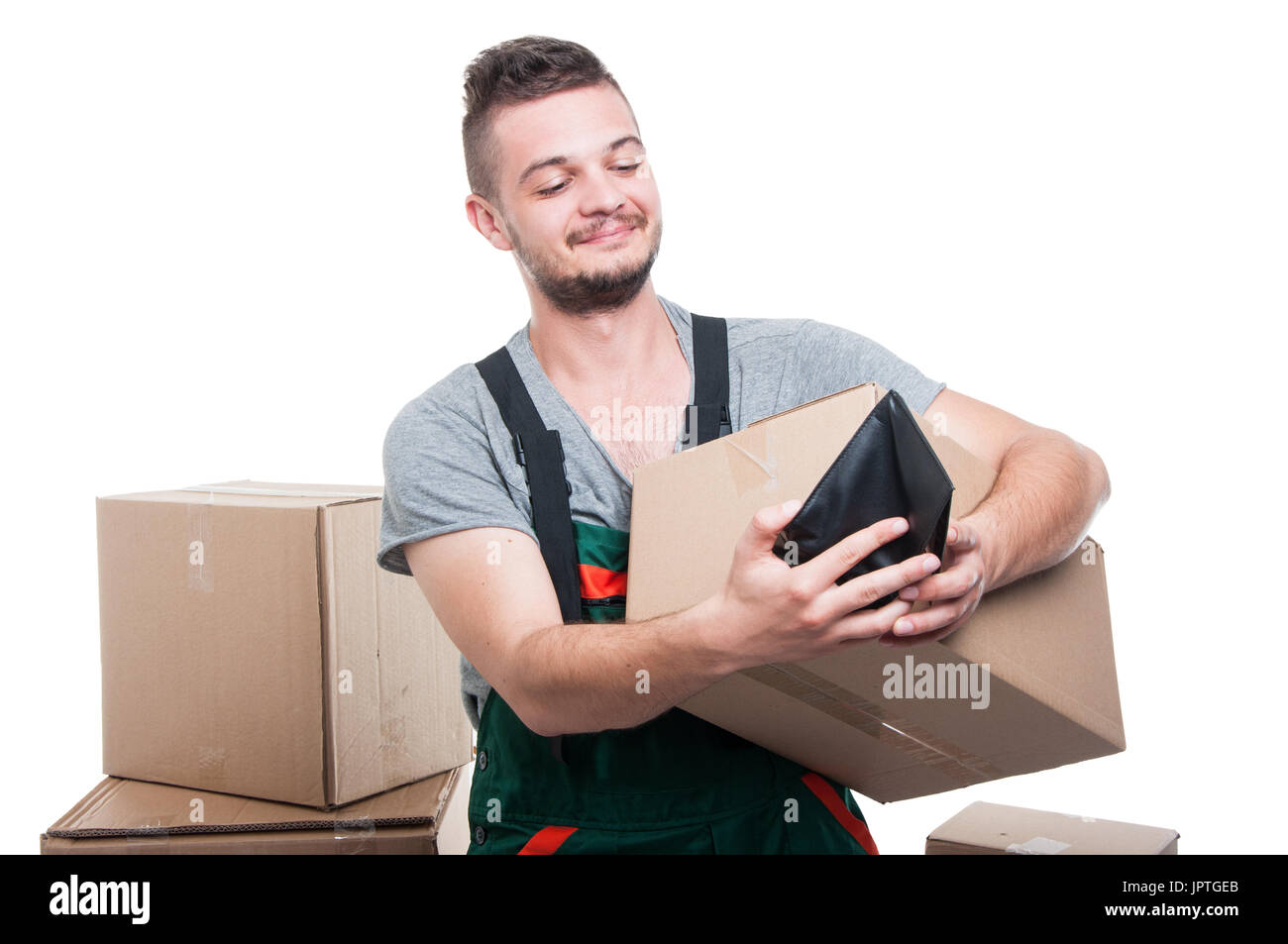 Happy mover guy looking into his wallet and smiling isolated on white ...