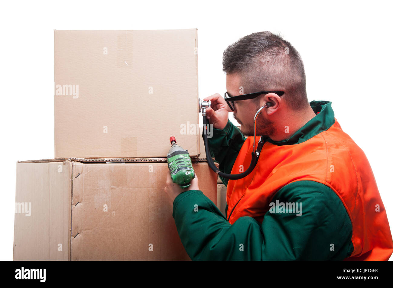 Man checking with stethoscope cardboard box holding drill isolated on ...