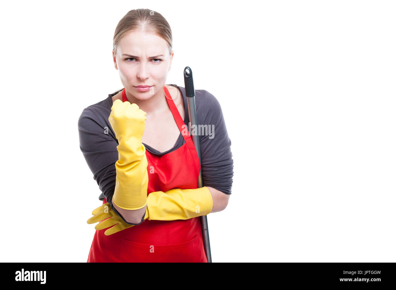 Mad or furious housekeeper showing her fist and fighting with somebody ...