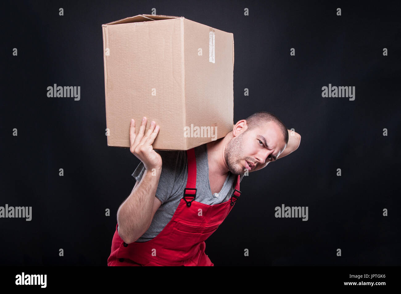 Man carrying big box hi-res stock photography and images - Alamy