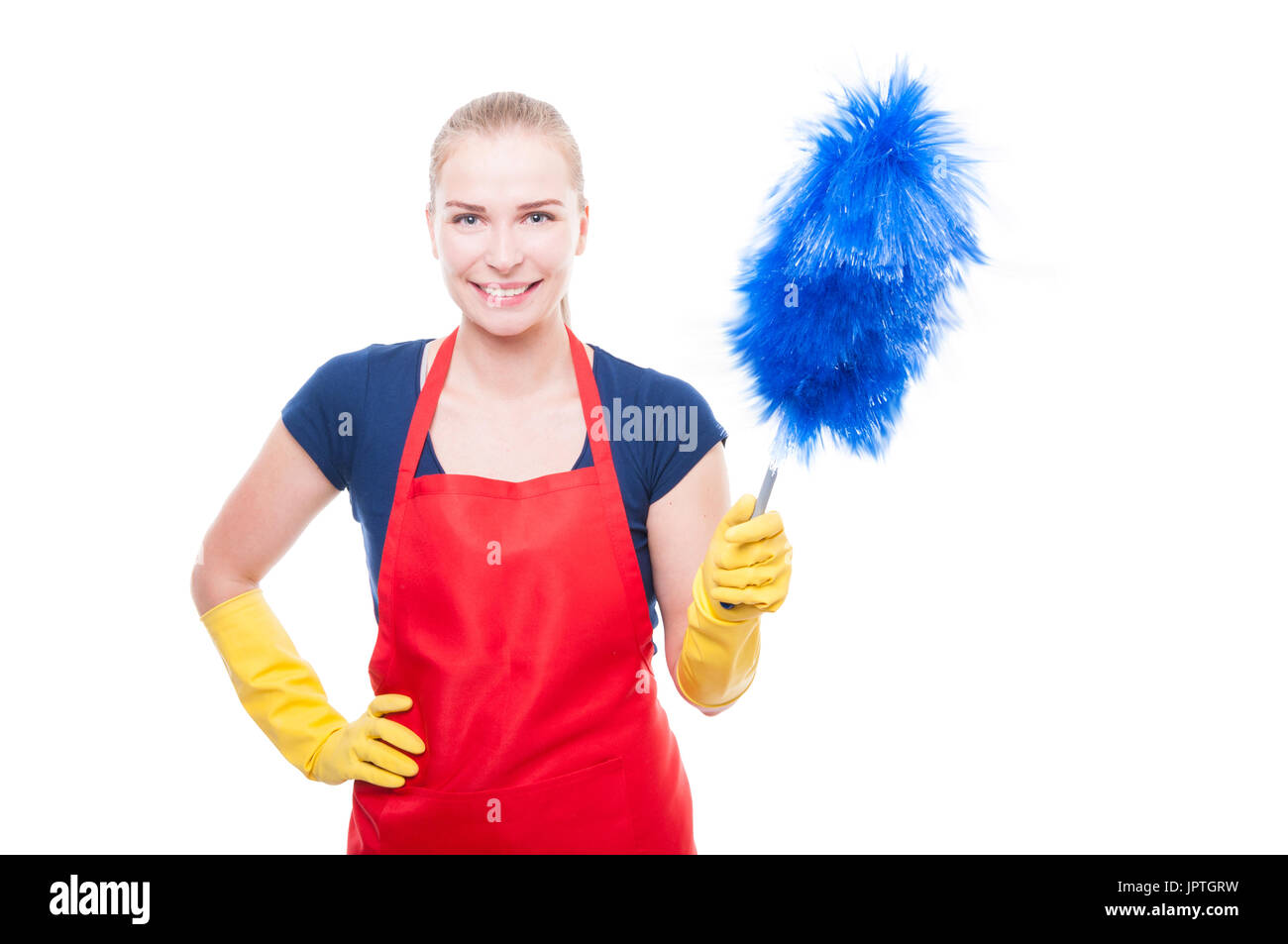 Cheerful housekeeper with dust cleaner doing her job isolated on white ...
