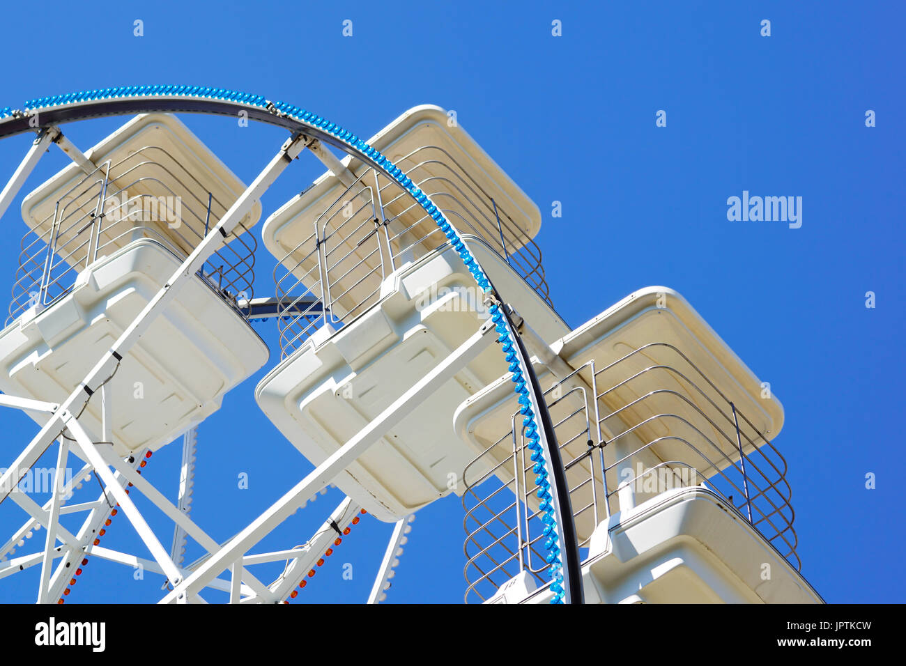 Panoramic wheel . Underside view of a ferris wheel rotating downward ...
