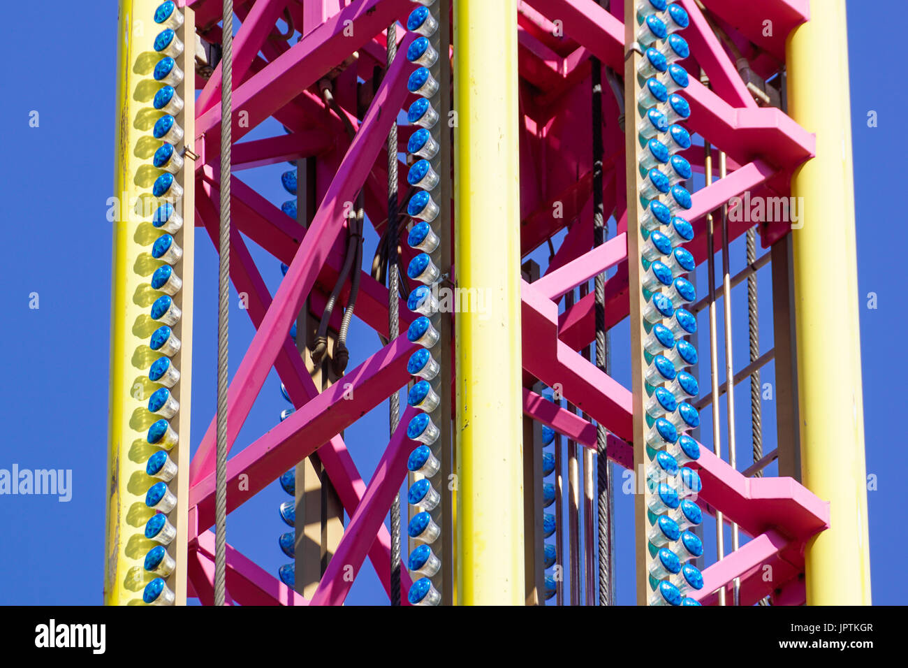 large flying metal carousel ride machine detail Stock Photo - Alamy