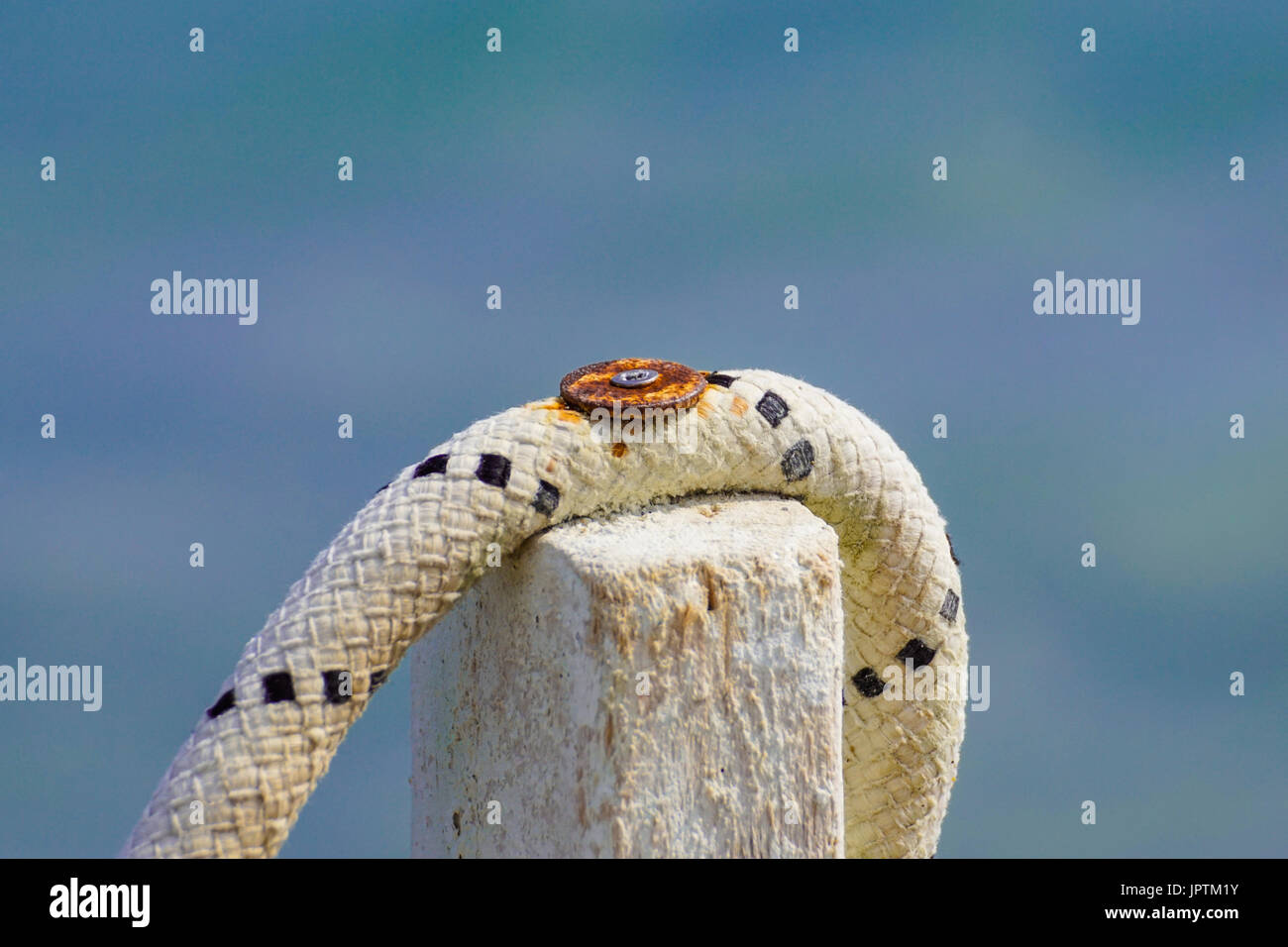 Old rope tied wooden pole hi-res stock photography and images - Alamy