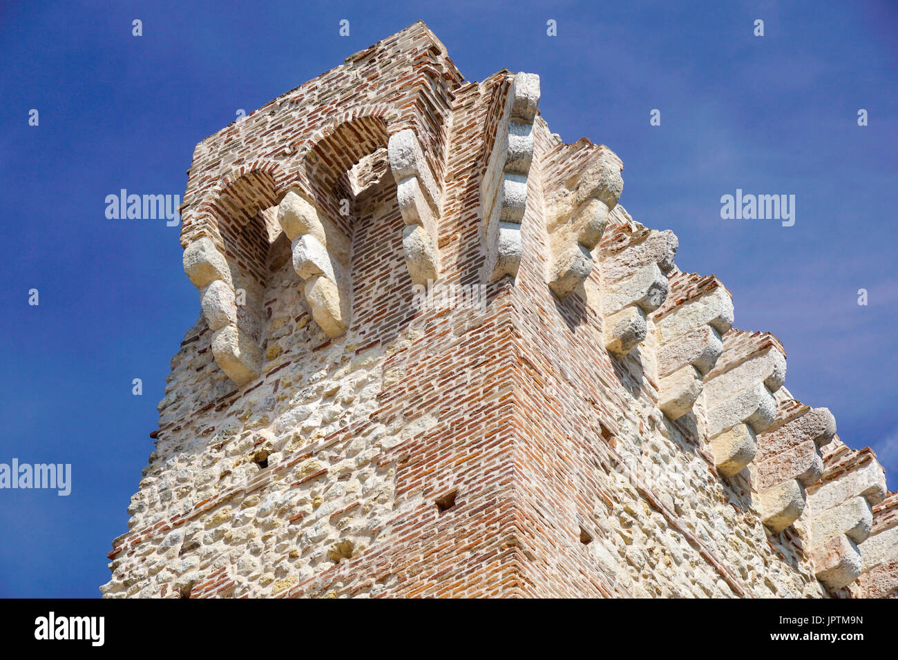 ruins of old medieval castle . fortified wall and tower detail brick ...