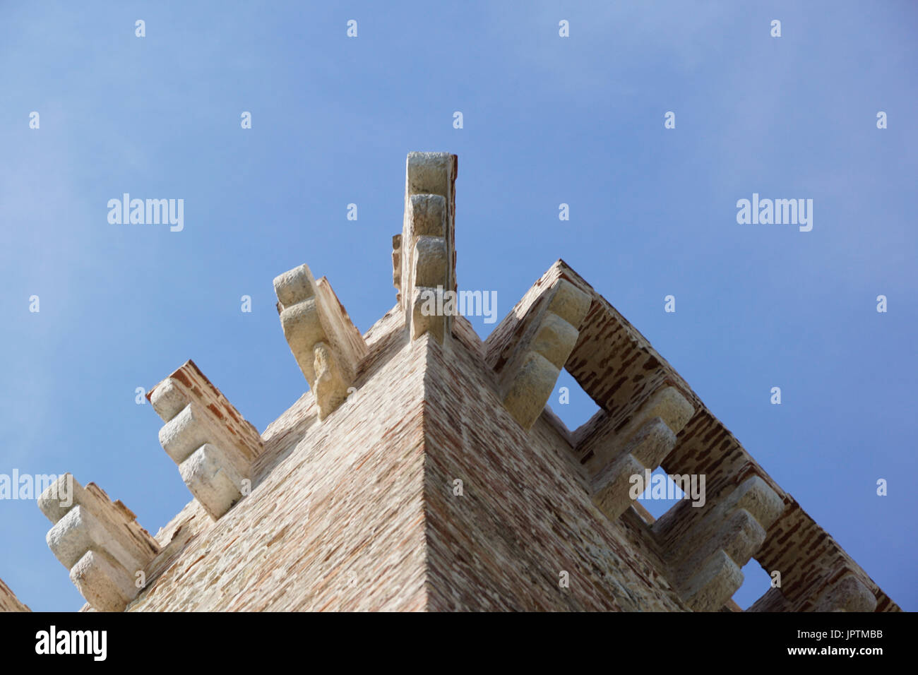 ruins of old medieval castle . fortified wall and tower detail brick ...