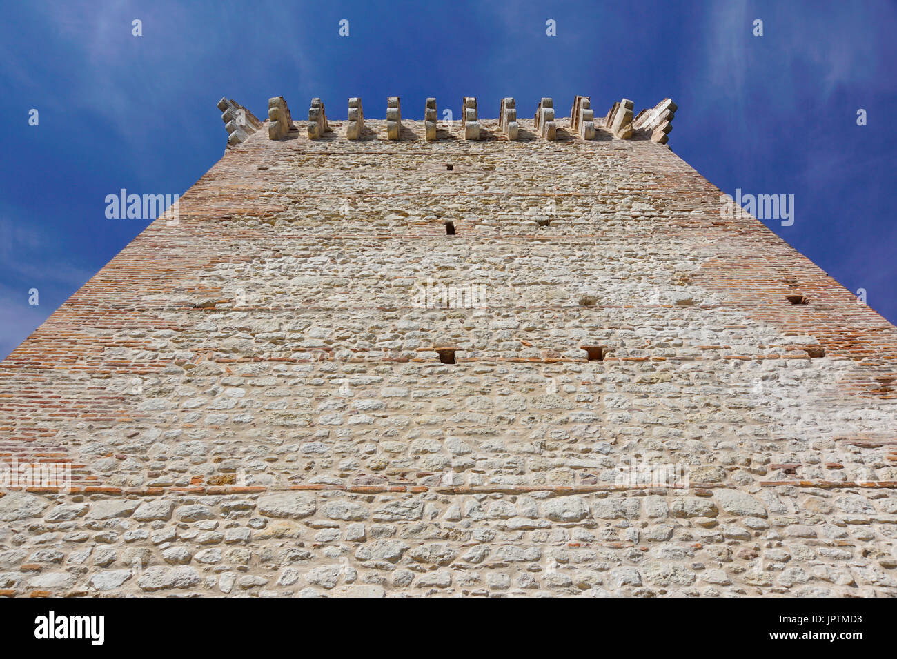 ruins of old medieval castle . fortified wall and tower detail brick ...