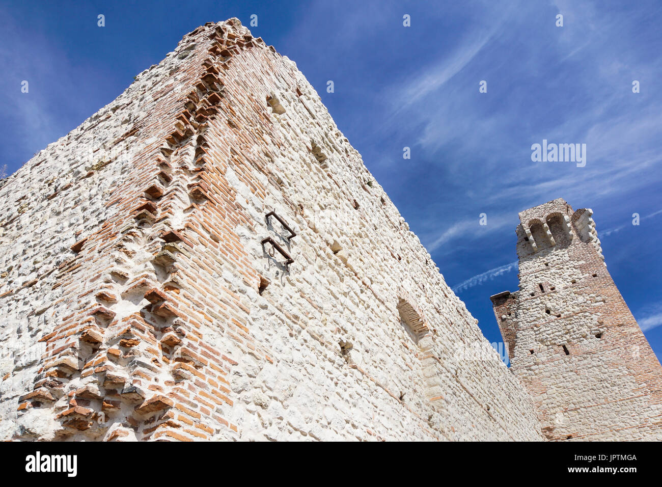 ruins of old medieval castle . fortified wall and tower detail brick ...
