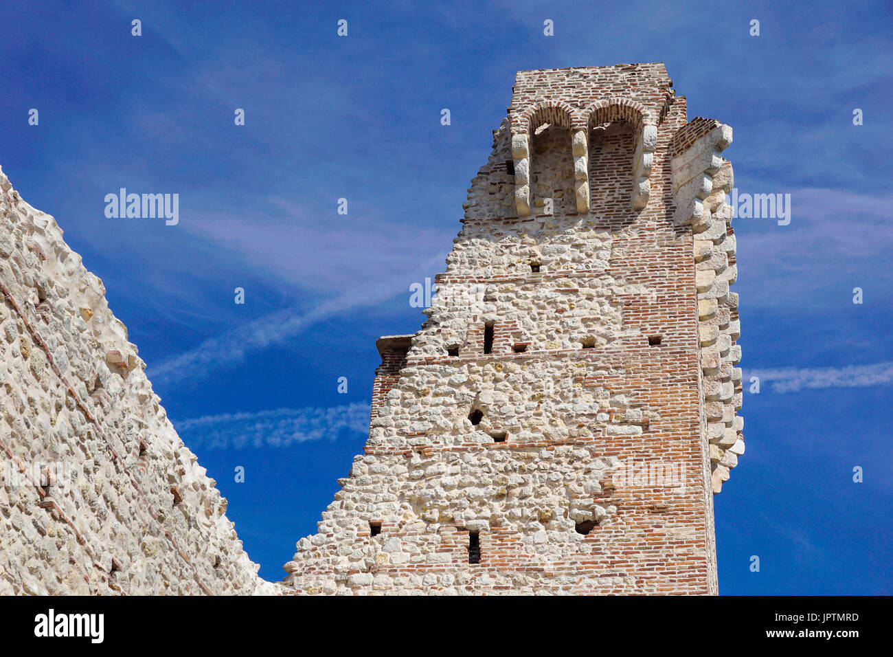 ruins of old medieval castle . fortified wall and tower detail brick ...