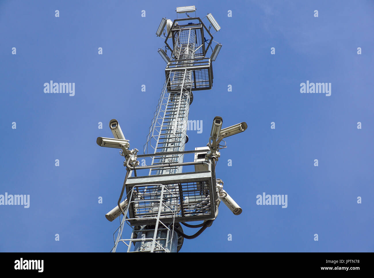 security camera on pole high tower of CCTV system in daytime Stock ...