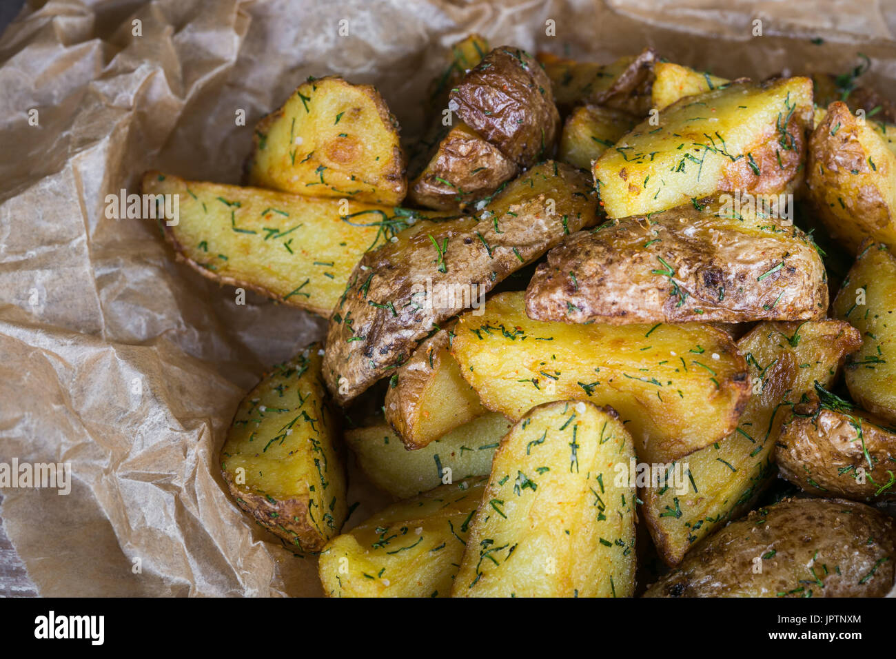 Fried Potato wedges. Fast food. Potato country style with dill on ...