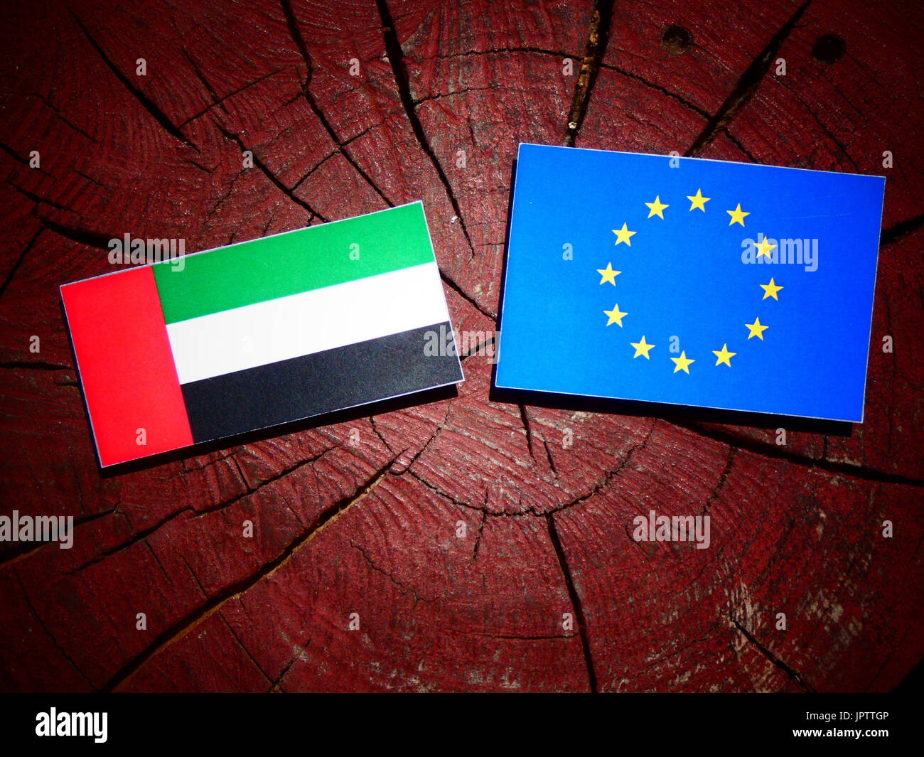 United Arab Emirates flag with EU flag on a tree stump isolated Stock ...