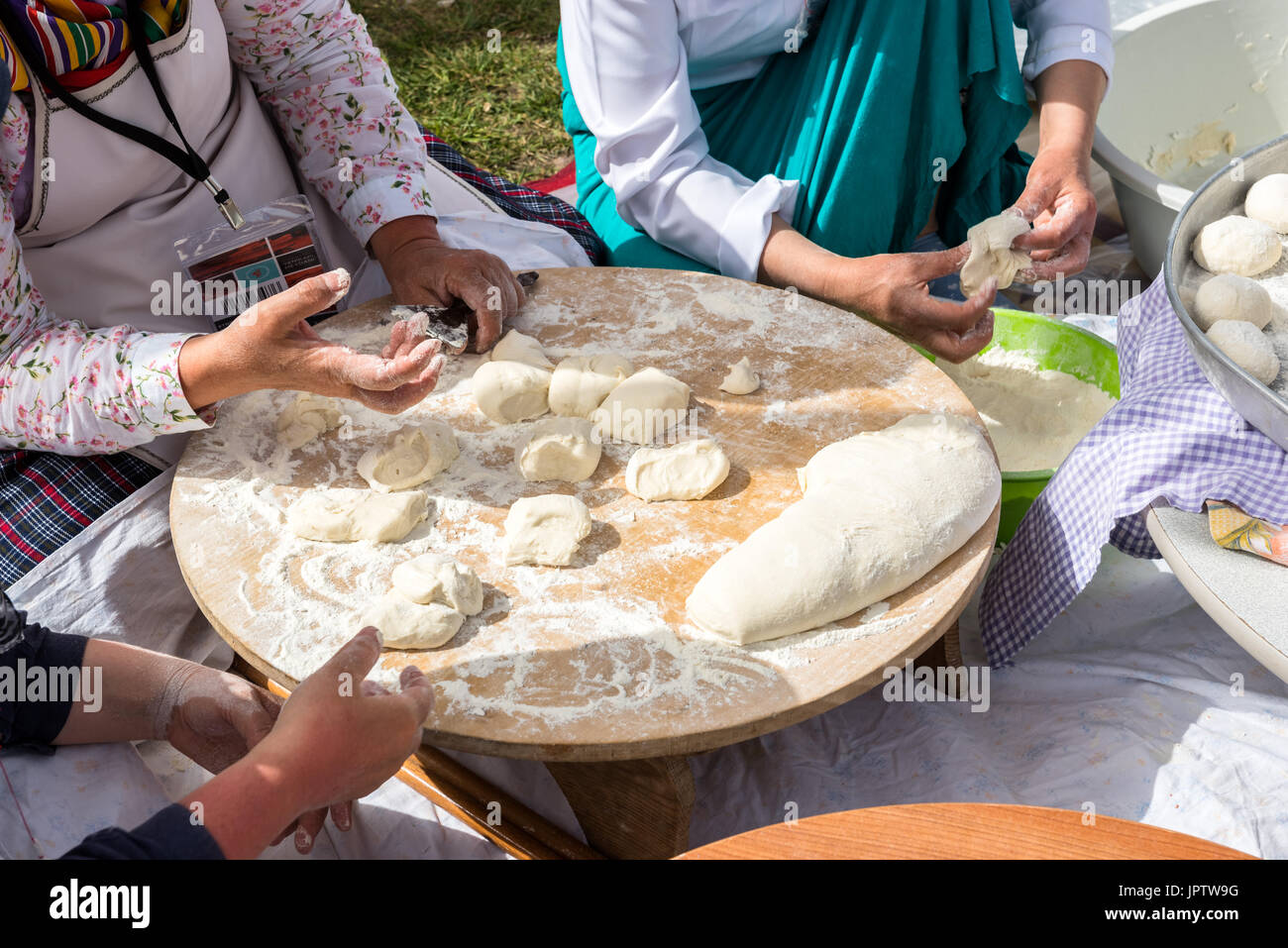 Preparation of a traditional Turkish yufka for pastries - gozleme by ...