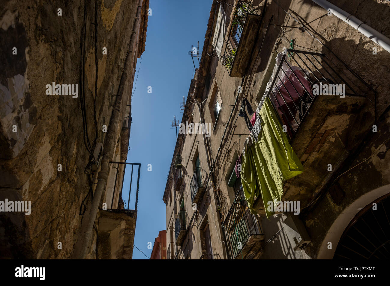 Laundry hanging on a balcony in the oldtown of Tarragona, Spain 2017 ...