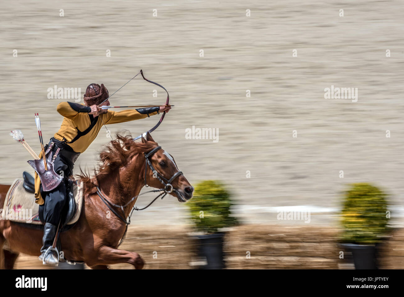 Unidentified medieval archer in costumes of ancient Turkish troops and ...