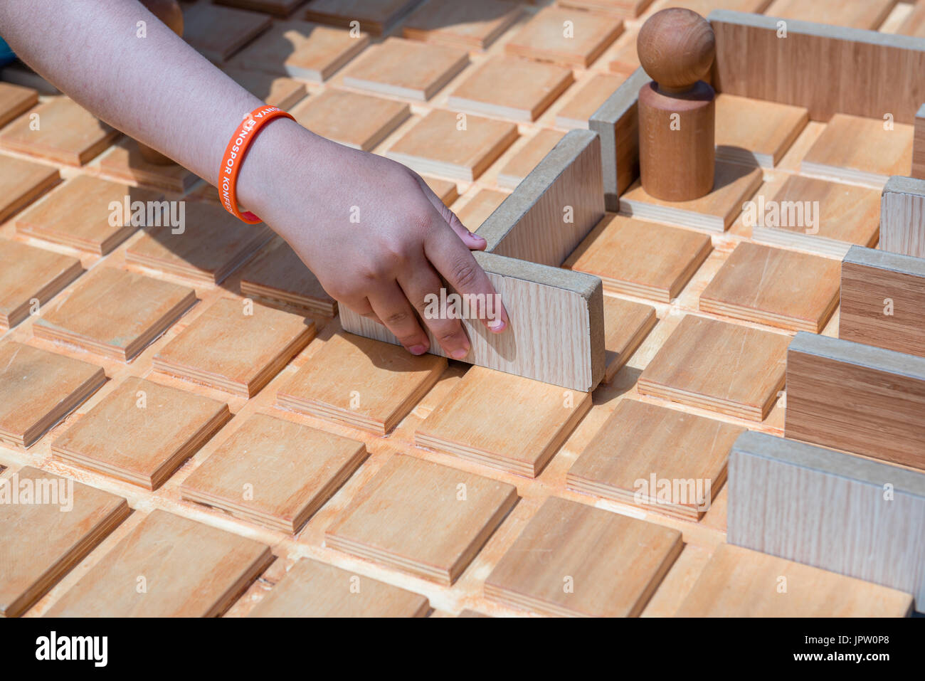 children play a traditional Turkish wooden puzzle game Stock Photo - Alamy