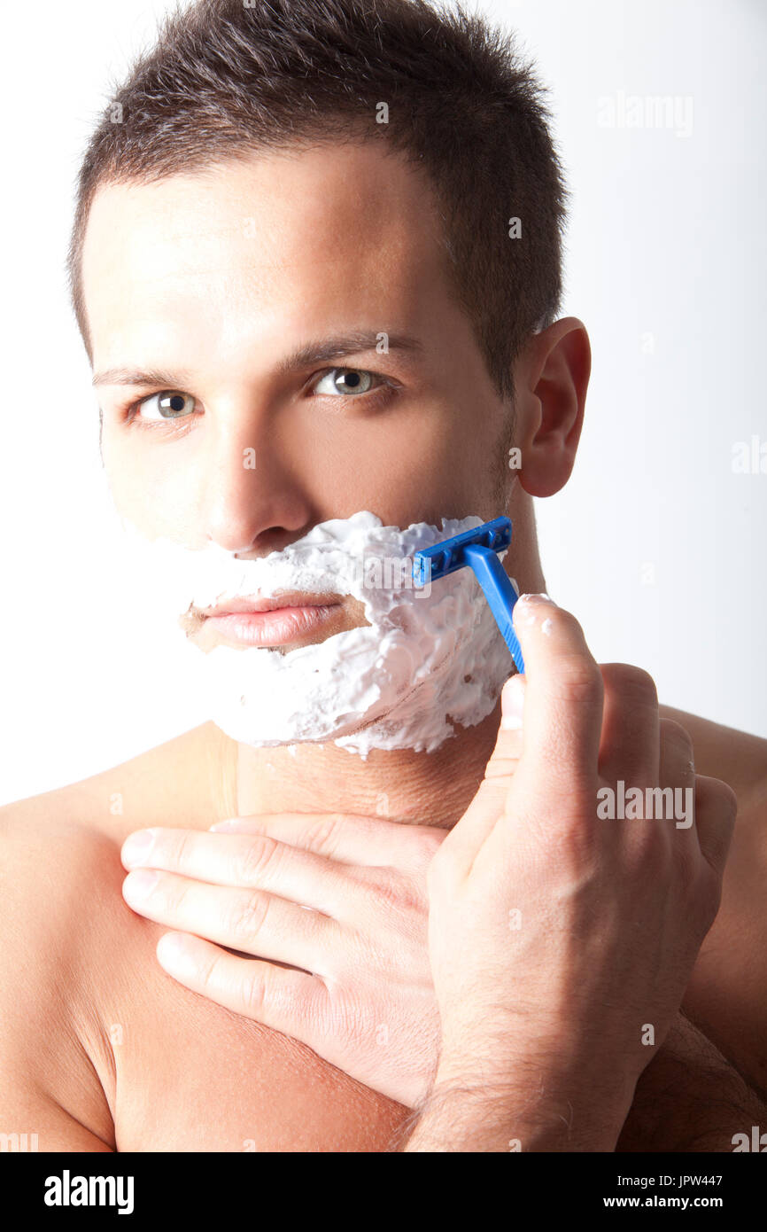 man shaving with razor Stock Photo - Alamy