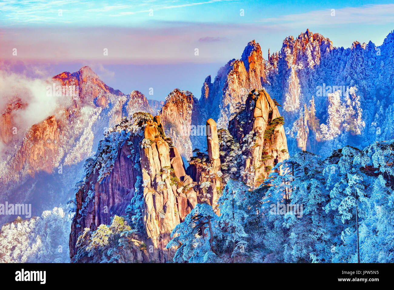 Sunset above the colorful peaks of Huangshan National park. China Stock Photo - Alamy