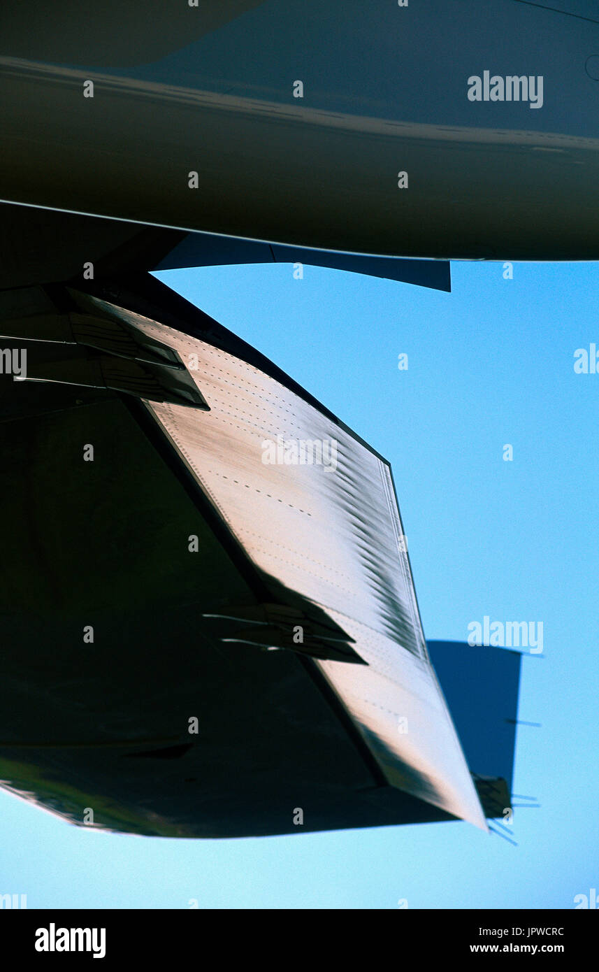 aileron deflected down on the wing of a Gulf Air Airbus A330-200 Stock ...