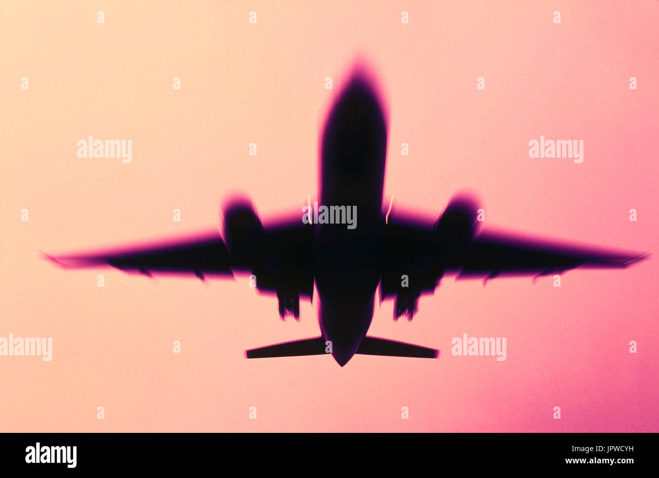 purple colourised cross processed image with motion-blur of a Boeing ...