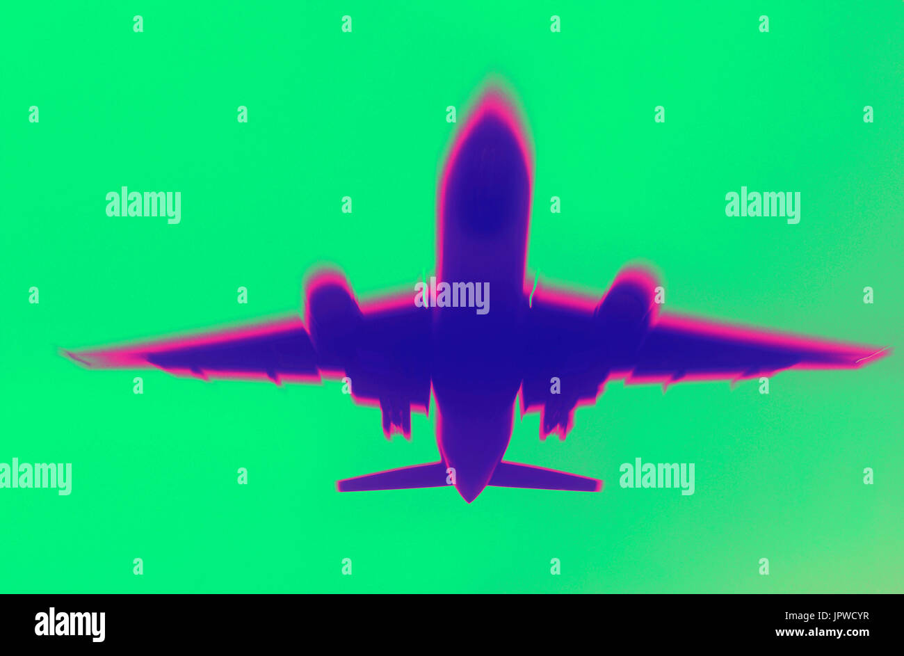colourised green sky with purple aircraft and motion-blurred image of a ...