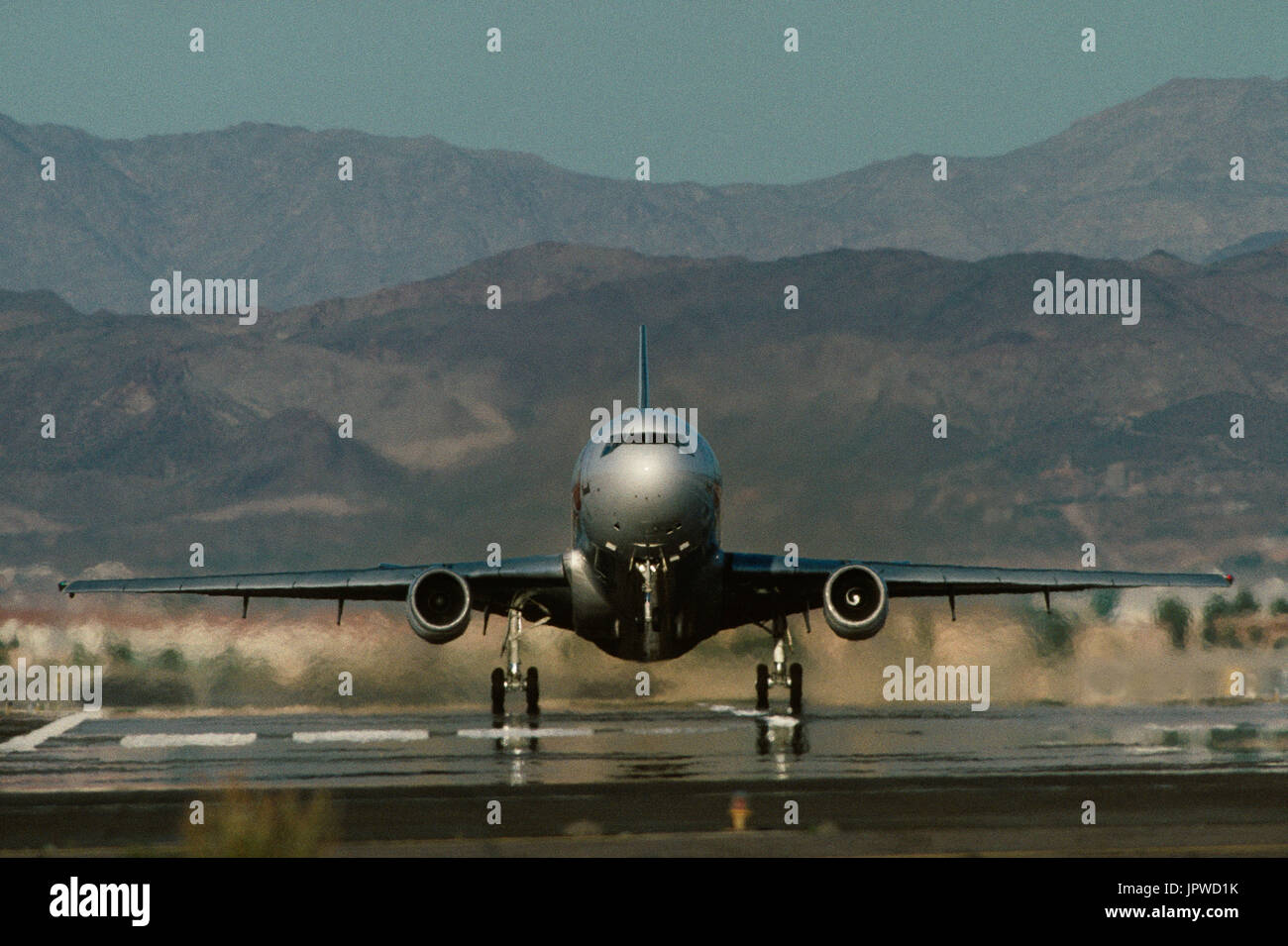 Sun Country Airlines McDonnell Douglas DC-10-10 taking-off with hills ...