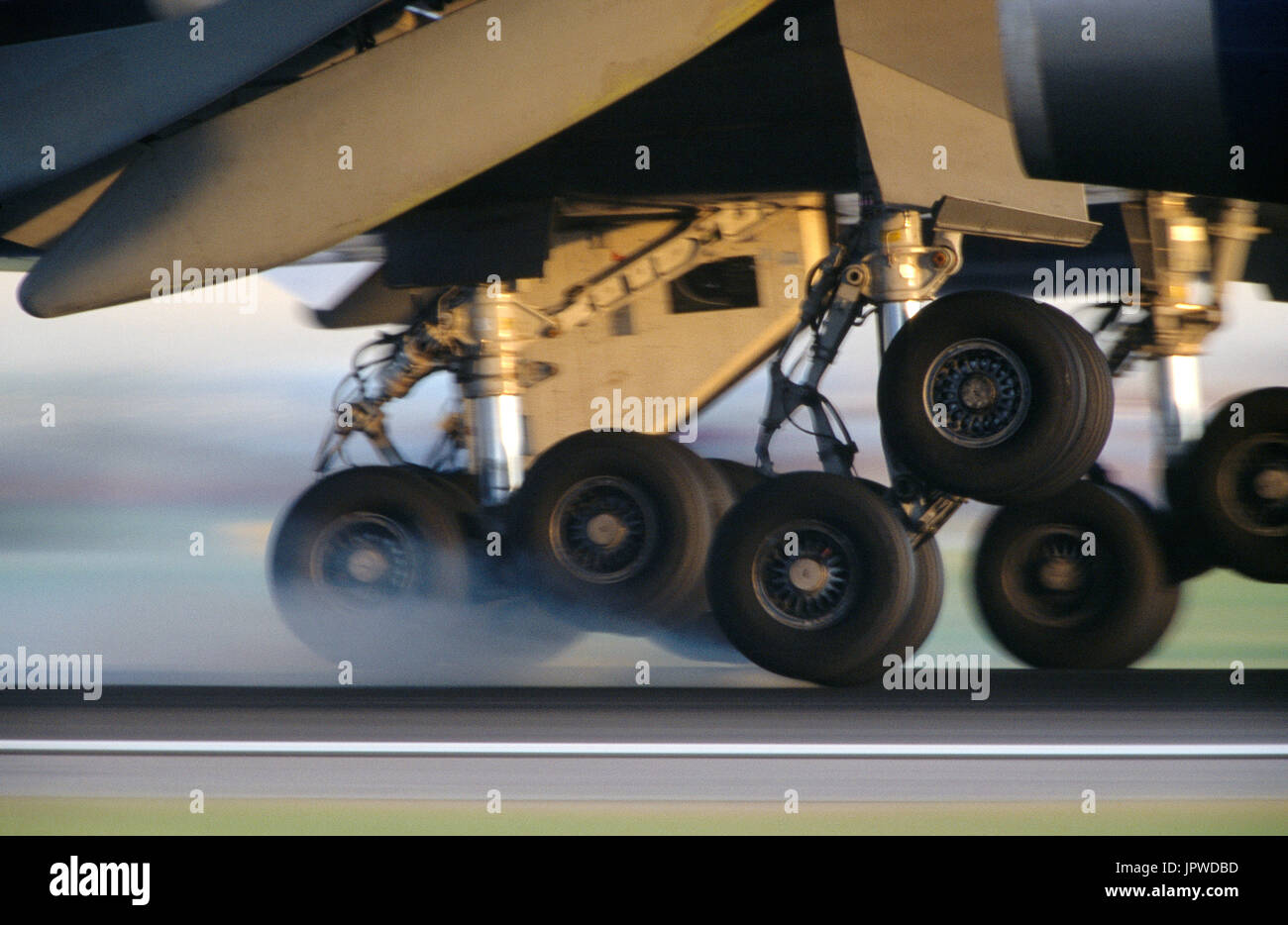 boat-fairing and smoking-tyres of a Boeing 747 at touchdown Stock Photo ...