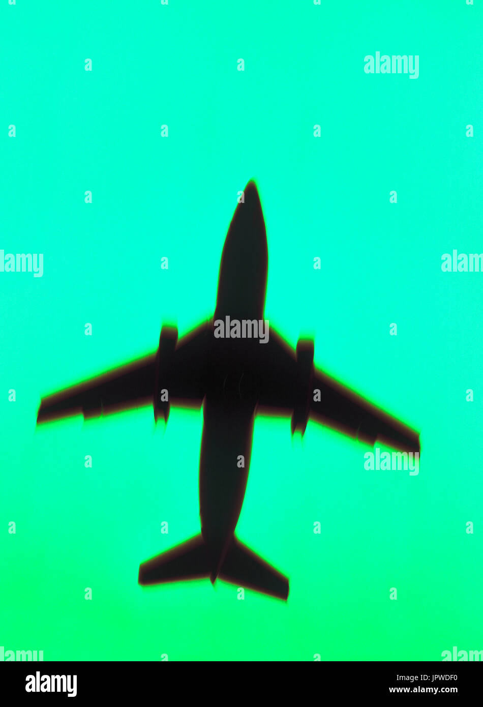 Boeing 737 flying colourised purple motion-blurred image Stock Photo ...