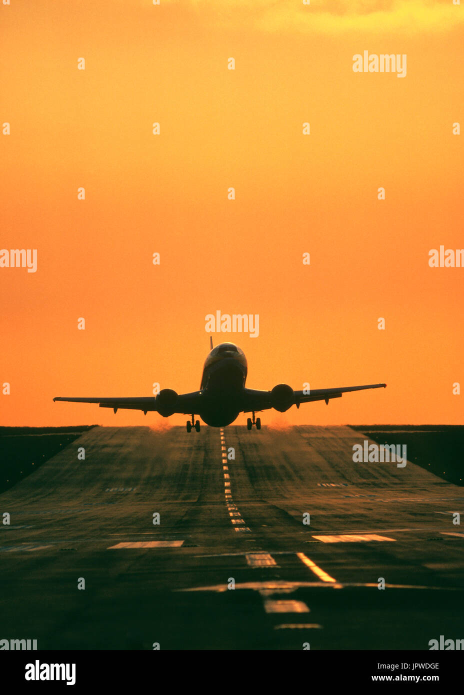 Boeing 737-300 taking-off at dusk Stock Photo - Alamy