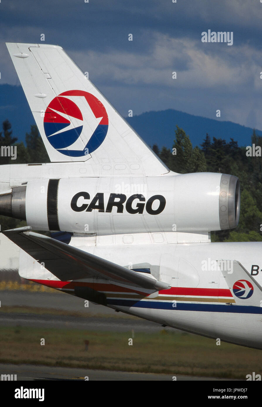 winglet, tail-fin, PW4460 engine-cowling with thrust-reverser deployed ...