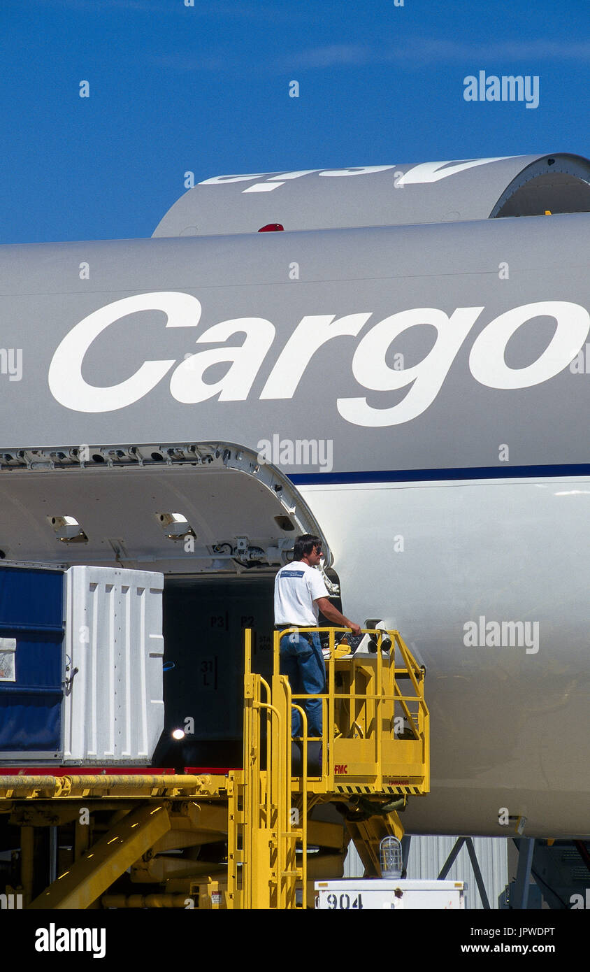 cargo being loaded into front side cargo door of an Asiana Airlines ...