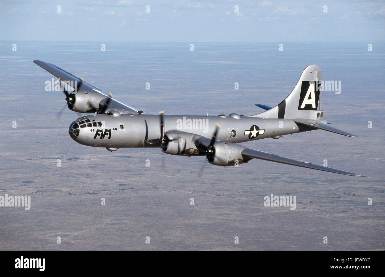 USAF Boeing B-29 Super Fortress named 'FiFi' flying over a desert landscape Stock Photo - Alamy