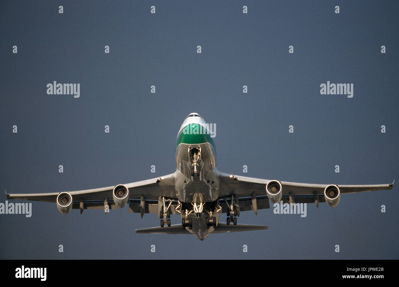 Cathay Pacific Airways Boeing 747 climbing out after take-off with ...