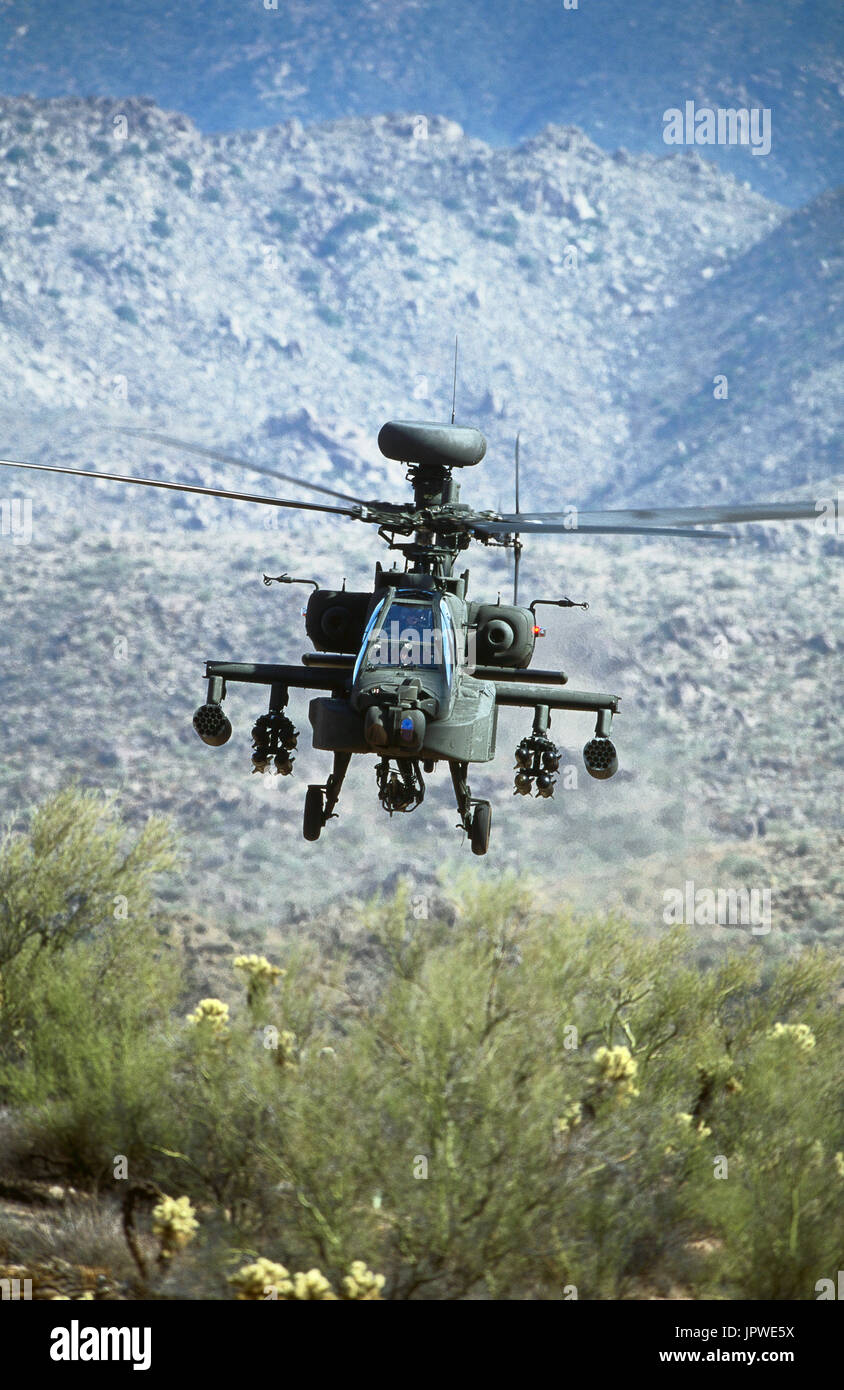 US Army Boeing AH-64D Apache Longbow low-flying over the Four Peaks ...