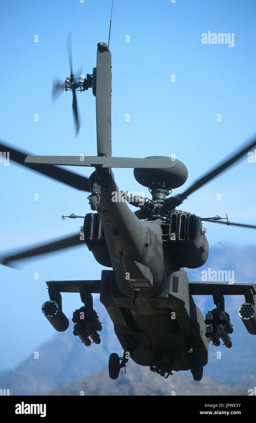 US Army Boeing AH-64D Apache Longbow low-flying over the Four Peaks ...