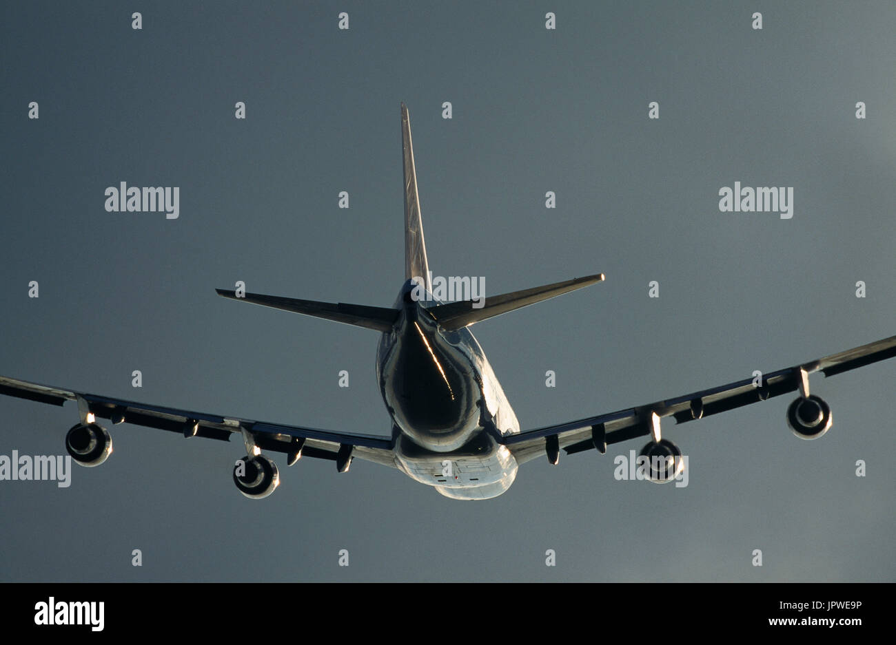 British Airways Boeing 747-100 climbing enroute on a grey-cloudy-day ...