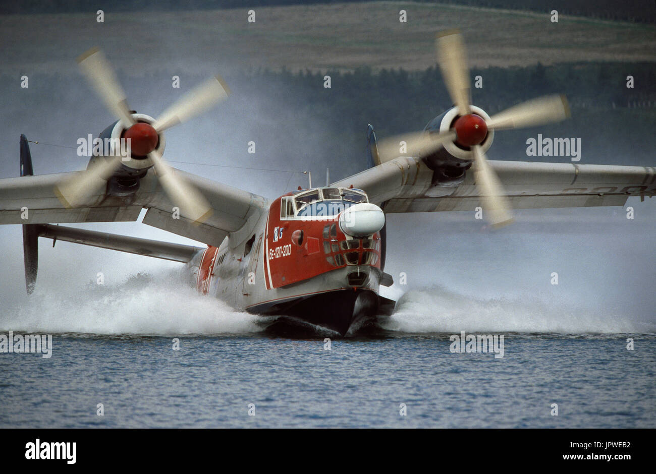 Beriev Be-12 Chaika taking-off in the blue sea of the bay with water ...