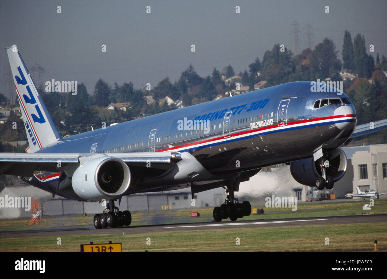 1st Boeing 777-300 prototype on 1st landing Stock Photo - Alamy