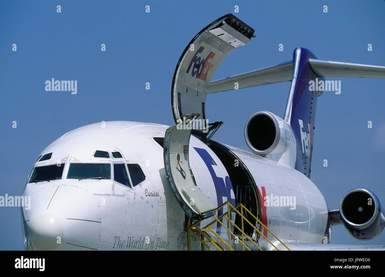 open cargo door on FedEx Boeing 727-100F parked named 'Clarissa' Stock ...