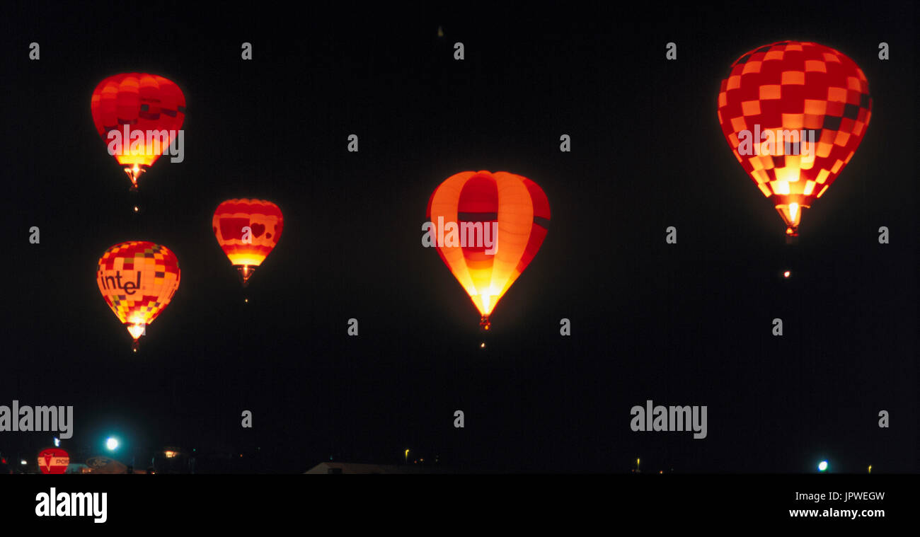 hot-air-balloons taking-off in a night lift off Stock Photo - Alamy